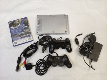 Pirkti PlayStation 2 Slim, Silver + controllers + game