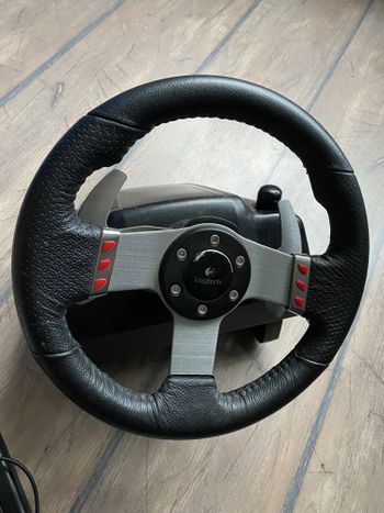 Pirkti Logitech G27 steering wheel and components.